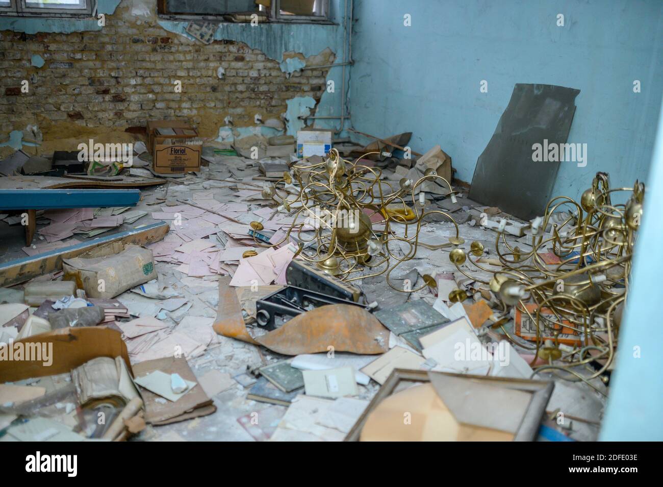 A scattered abandoned dirty room of an old damaged building Stock Photo ...