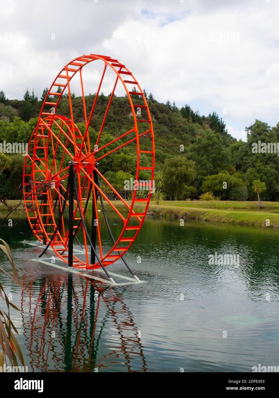 Orange Water Wheel In A Pond Stock Photo - Alamy