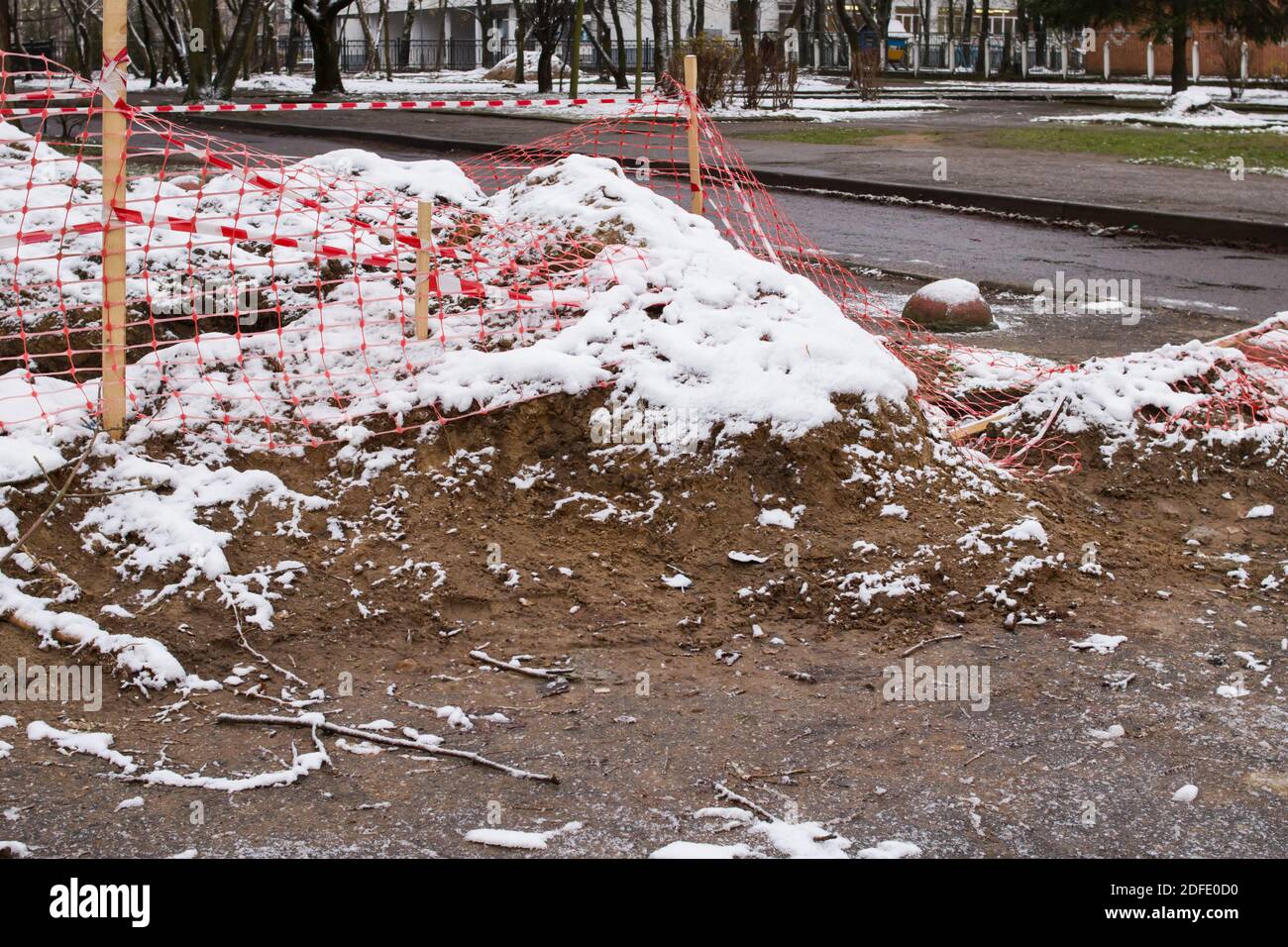 Red ribbon on construction work fence close up Stock Photo - Alamy