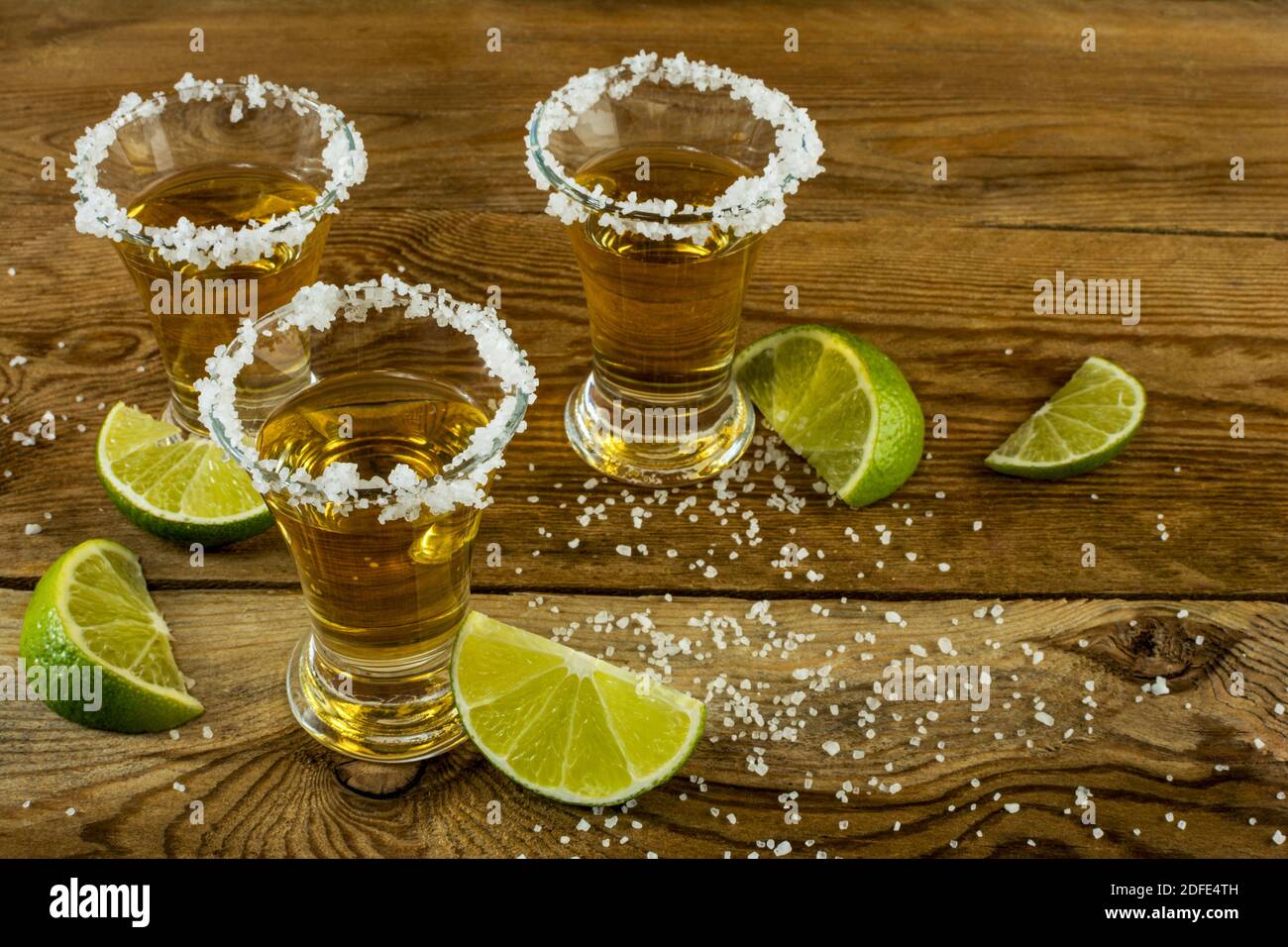 Gold Mexican tequila with lime and salt . Tequila. Tequila shot ...