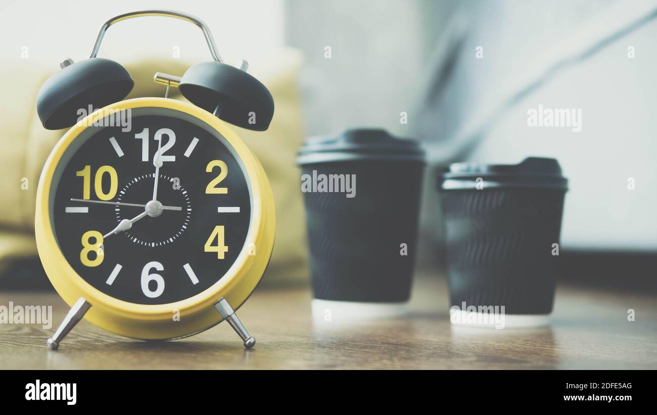 Retro clock with an alarm clock in the apartment,in the background ...