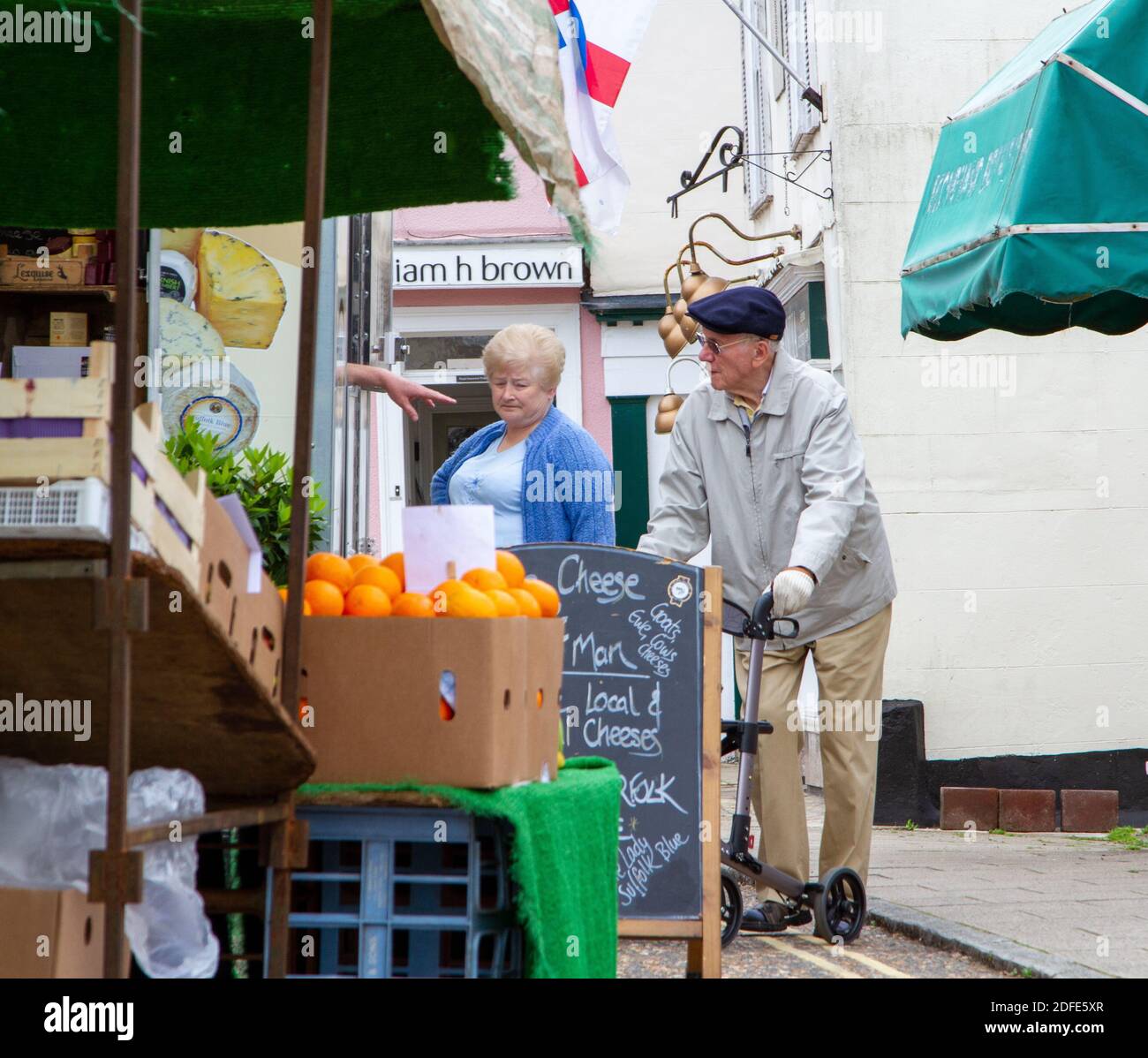 Man and woman being lectured by a hand Stock Photo - Alamy
