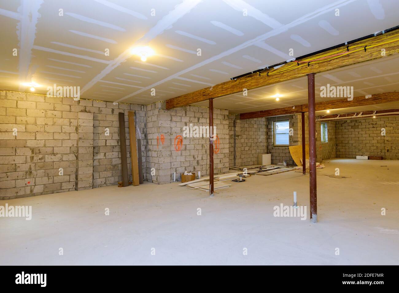 Framing of new house under construction home with basement unfinished ...