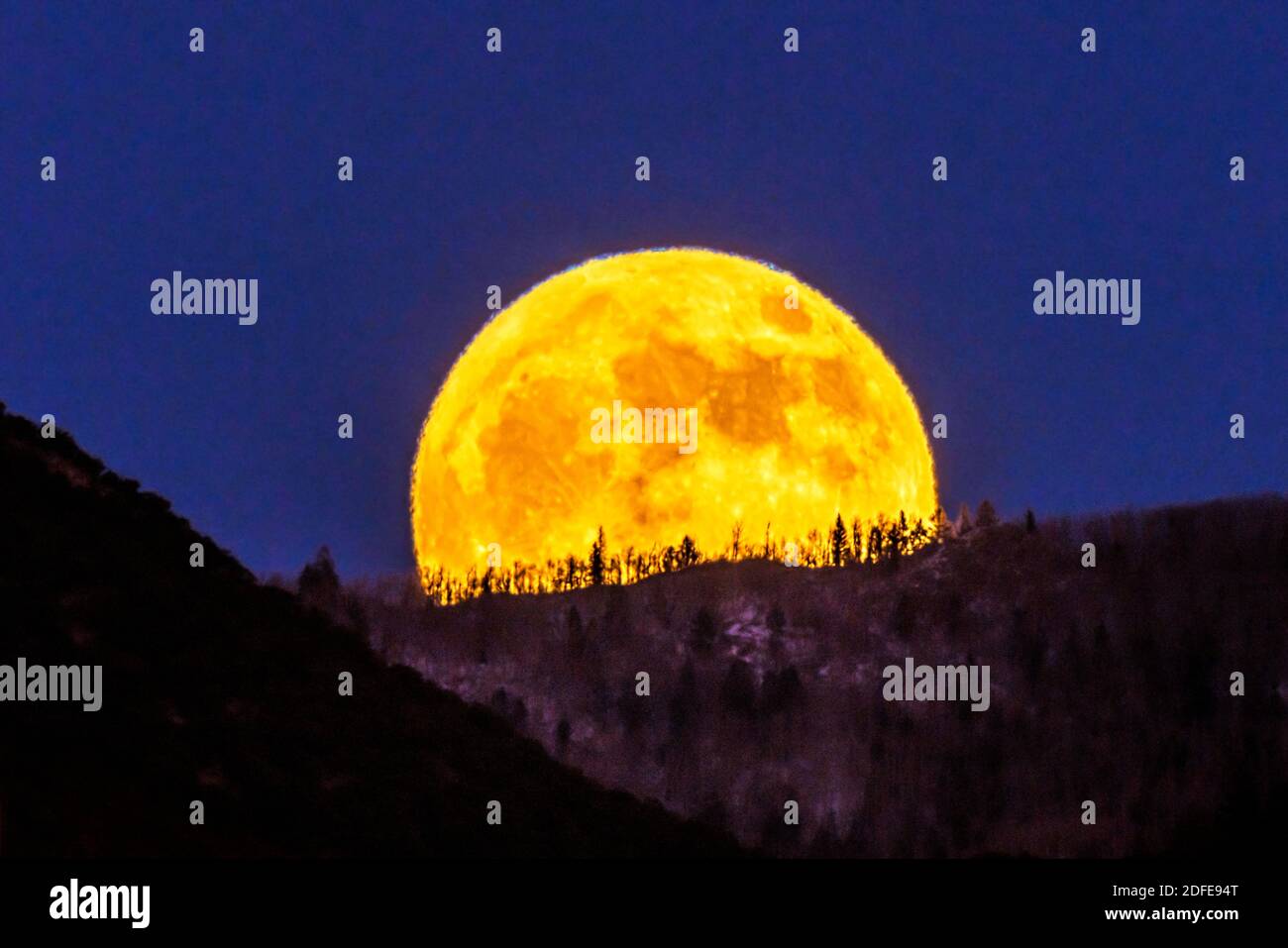 Full Beaver Moon; Frost Moon, Mourning Moon; rises over Rocky Mountains ...