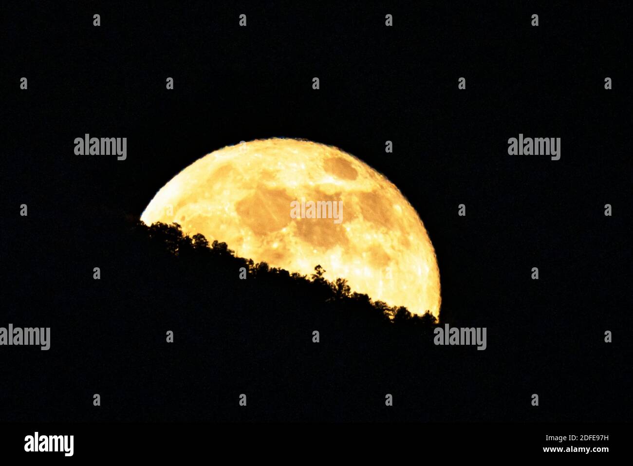 Full Beaver Moon; Frost Moon, Mourning Moon; rises over Rocky Mountains ...