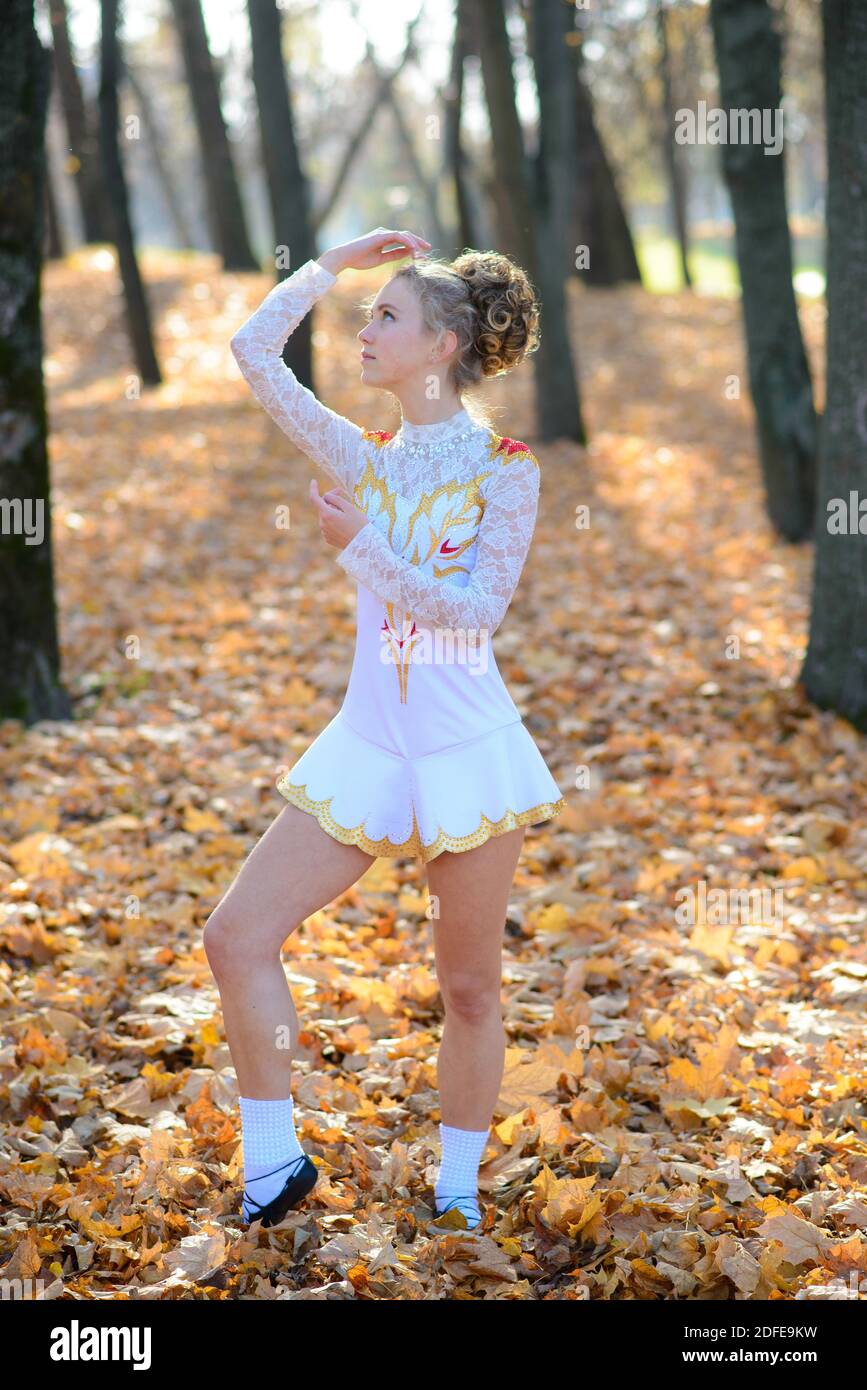 Ballerina dancing in nature park among autumn leaves Stock Photo - Alamy
