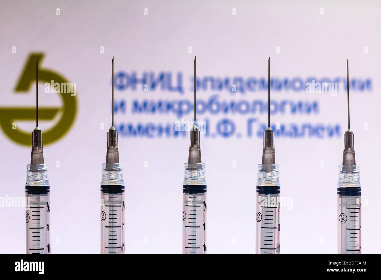 In this photo illustration various medical syringes seen with Gamaleya ...