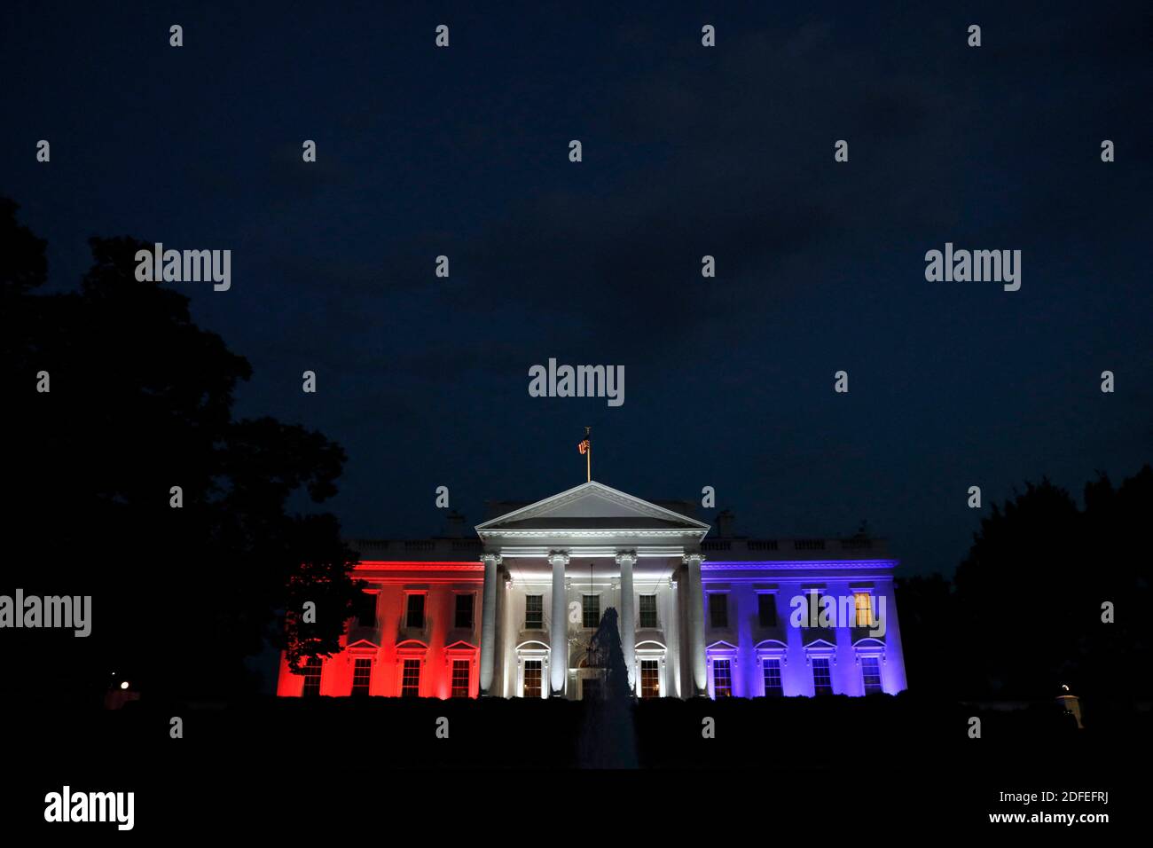 The White House is illuminates in red, white and blue colors to mark ...
