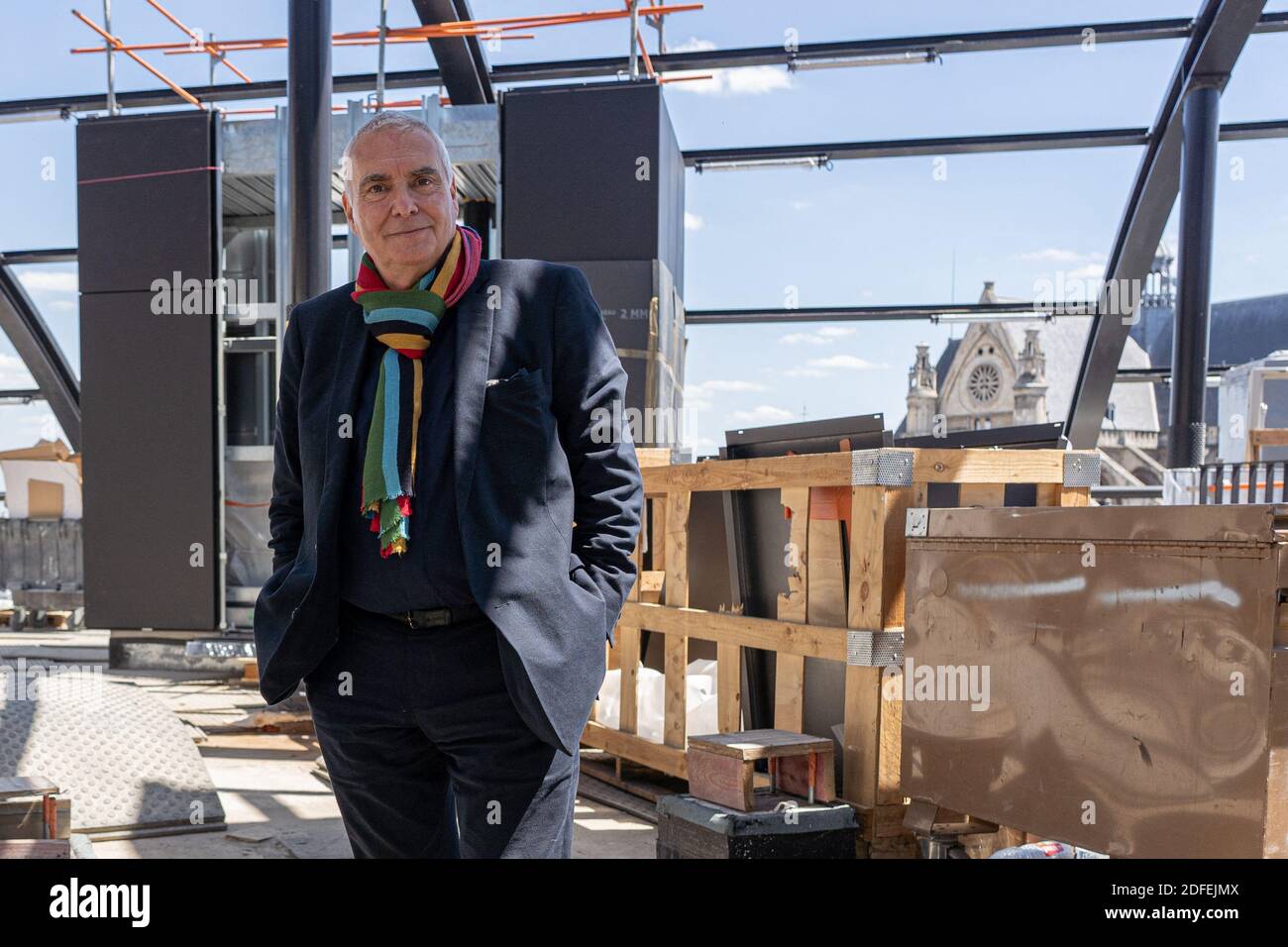 Project architect Dominique Perrault on the roof of the Poste du Louvre ...