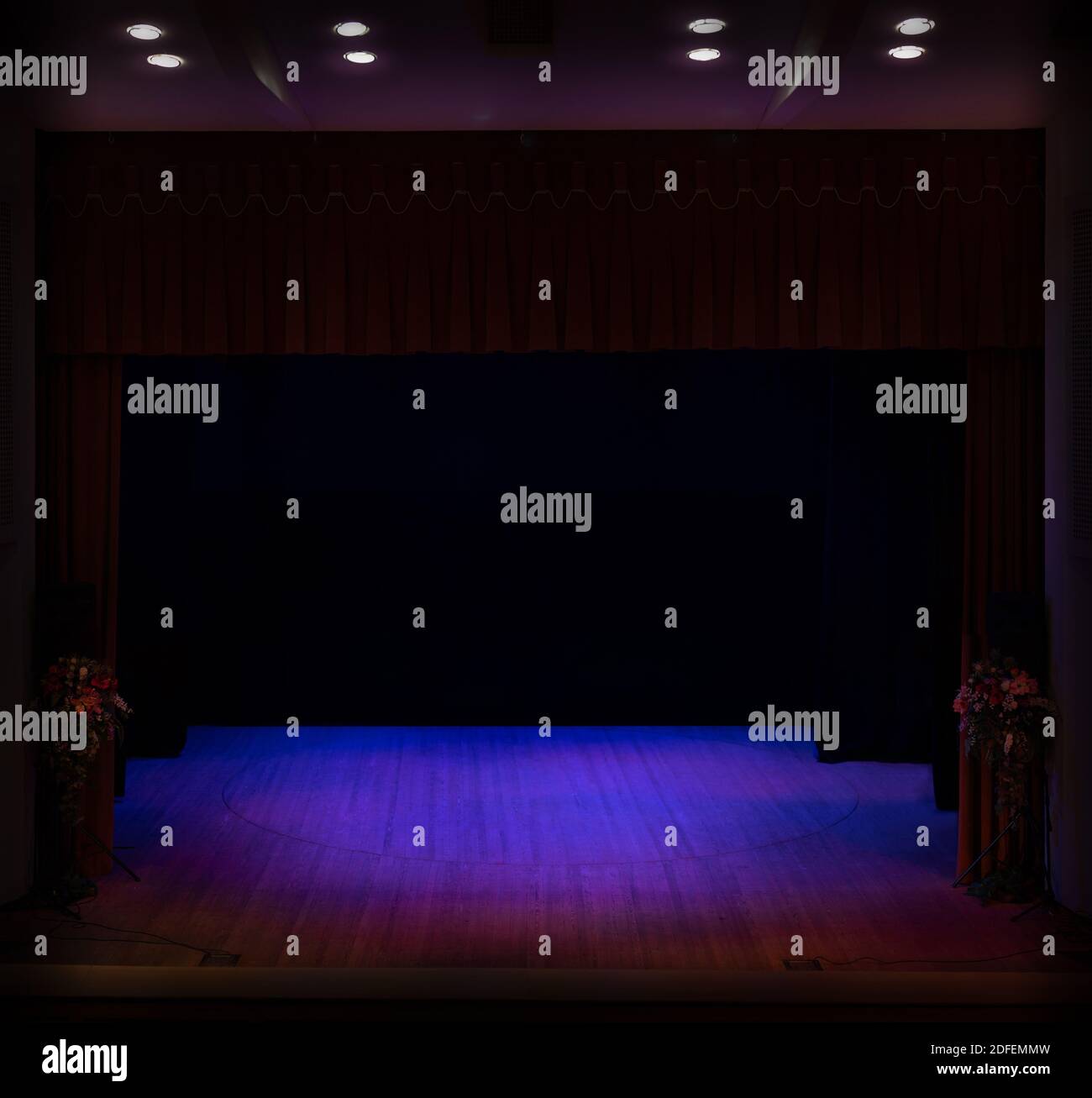 An empty stage of the theater, lit by spotlights before the performance ...