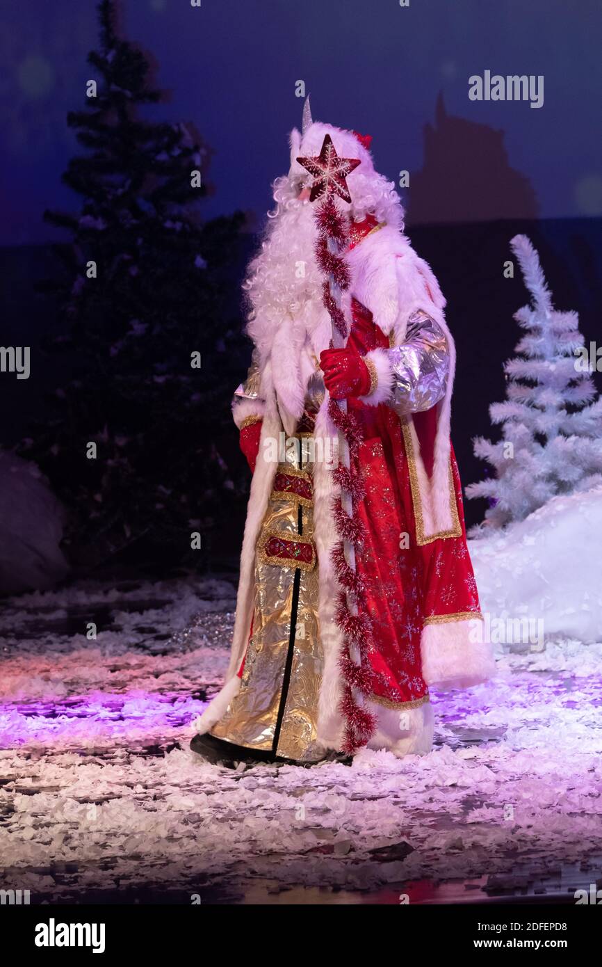 Emotional Santa Claus with a long white beard in a red coat and white ...