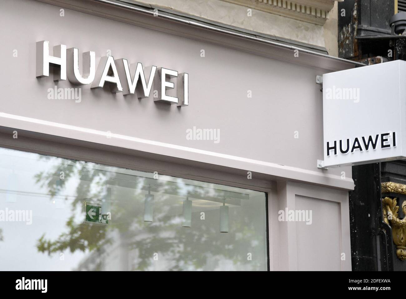 A shop sign of HUAWEI, on July 14, 2020, in Paris France. Photo by ...