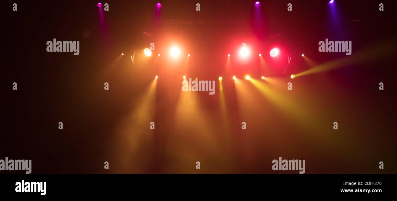scene, stage light with colored spotlights and smoke Stock Photo - Alamy