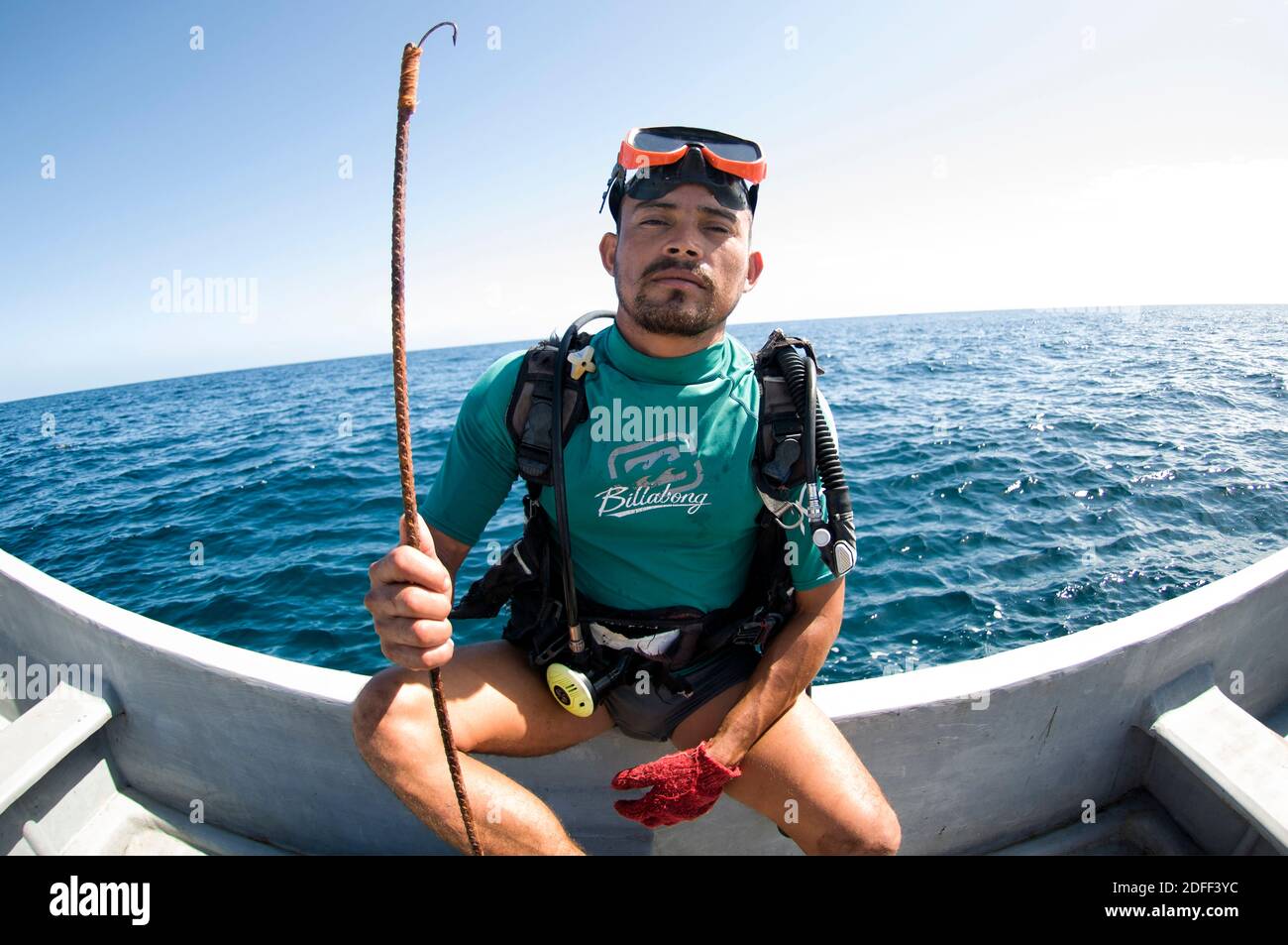 Scuba diver lobster fisherman sitting on the boatedge before getting in ...