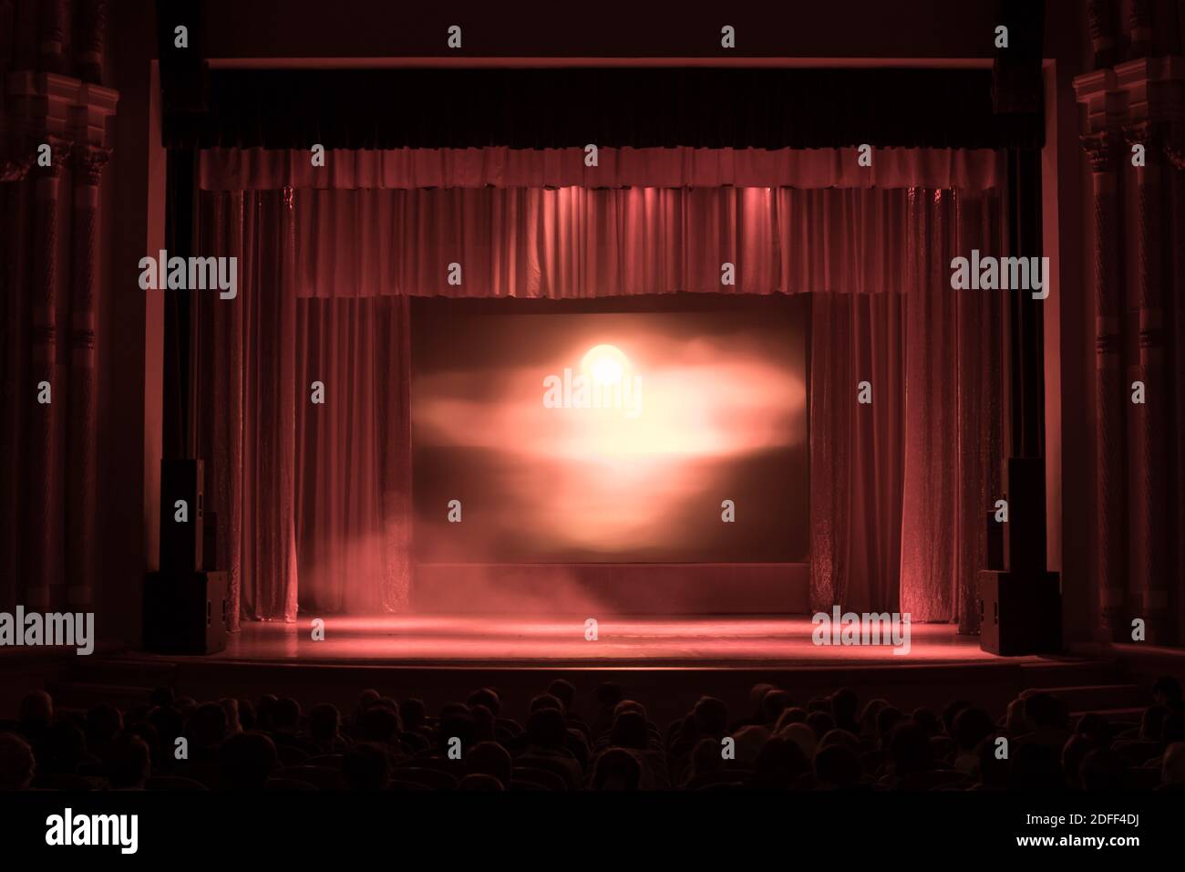 An empty stage of the theater, lit by spotlights before the performance ...