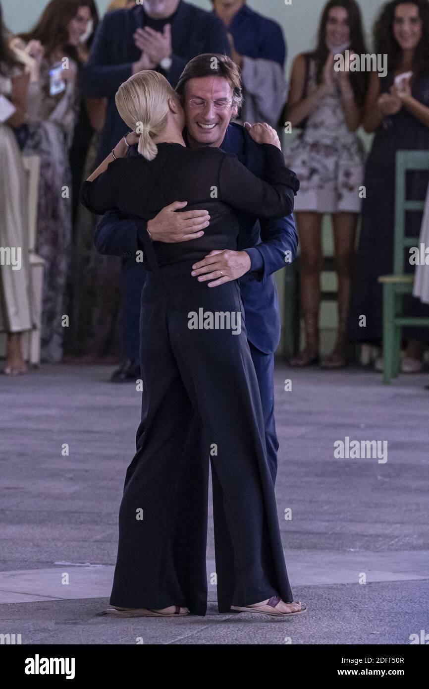 Maria Grazia Chiuri and Pietro Beccari attend the fashion show for the ...
