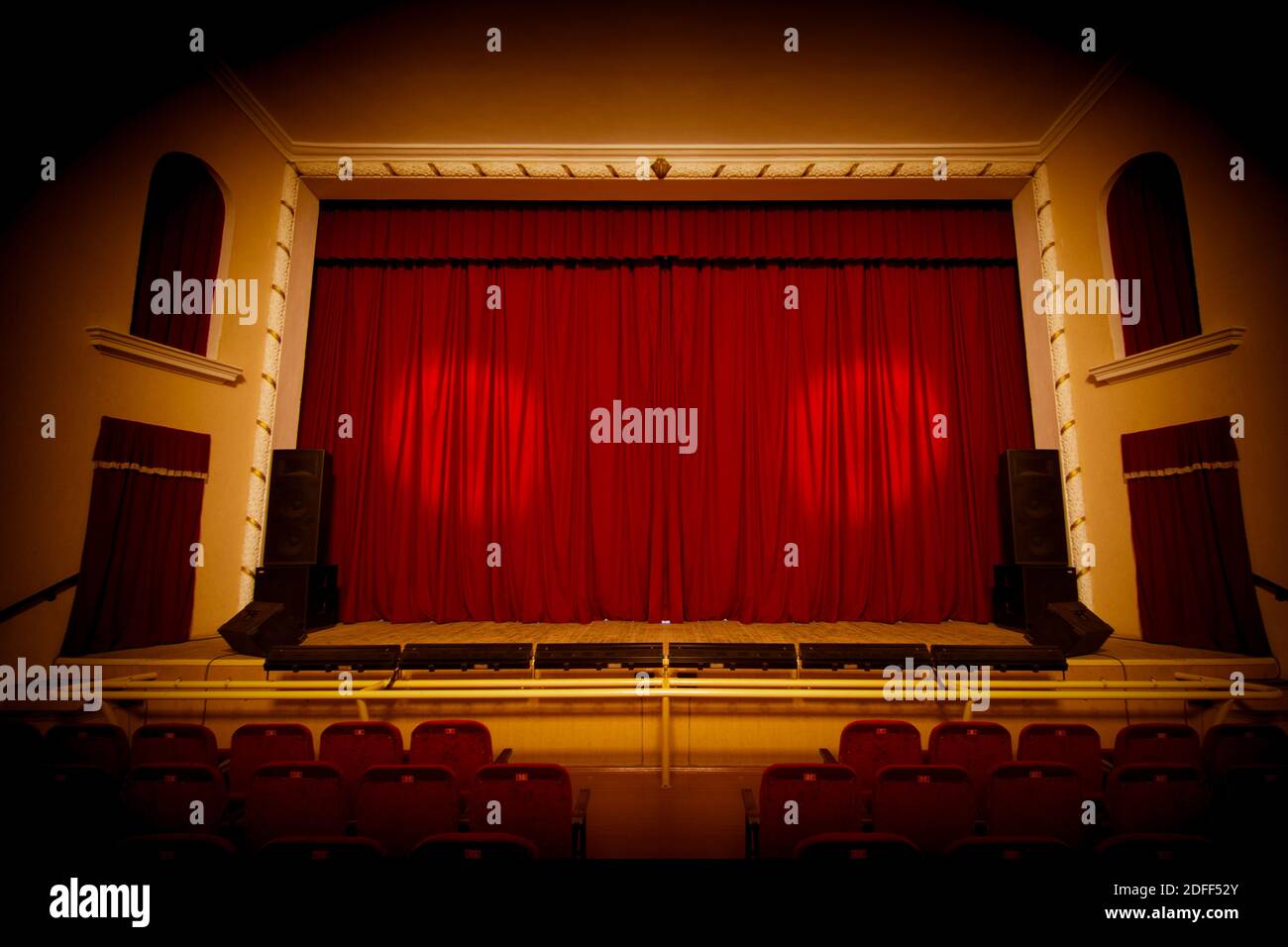 Theater stage and curtain illuminated by stage light Stock Photo - Alamy