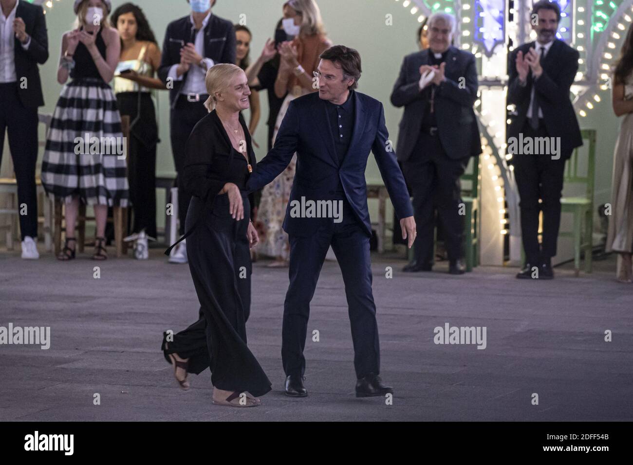 Maria Grazia Chiuri and Pietro Beccari attend the fashion show for the ...