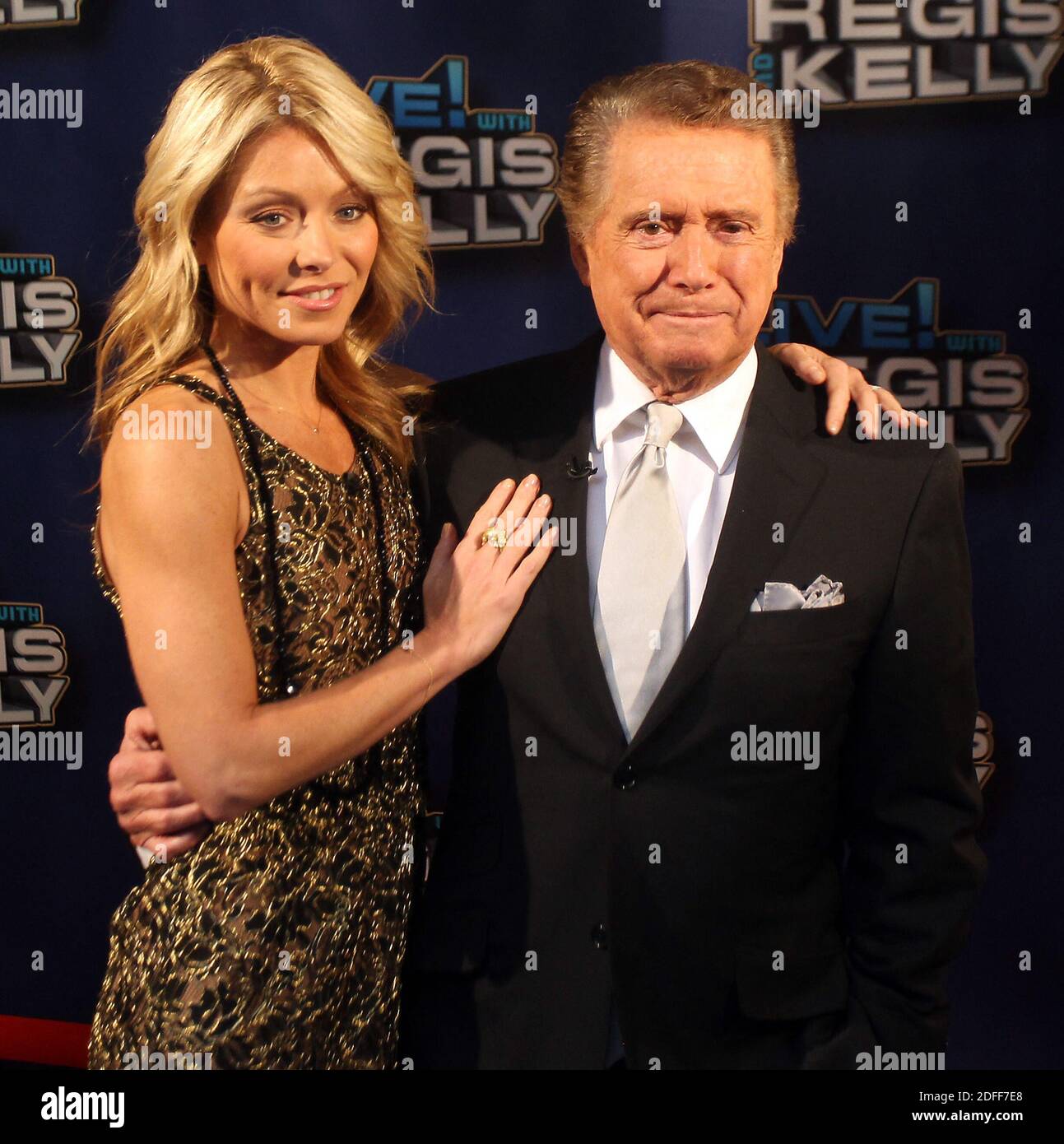 File photo dated November 18, 2011 of TV host Kelly Ripa and Regis ...