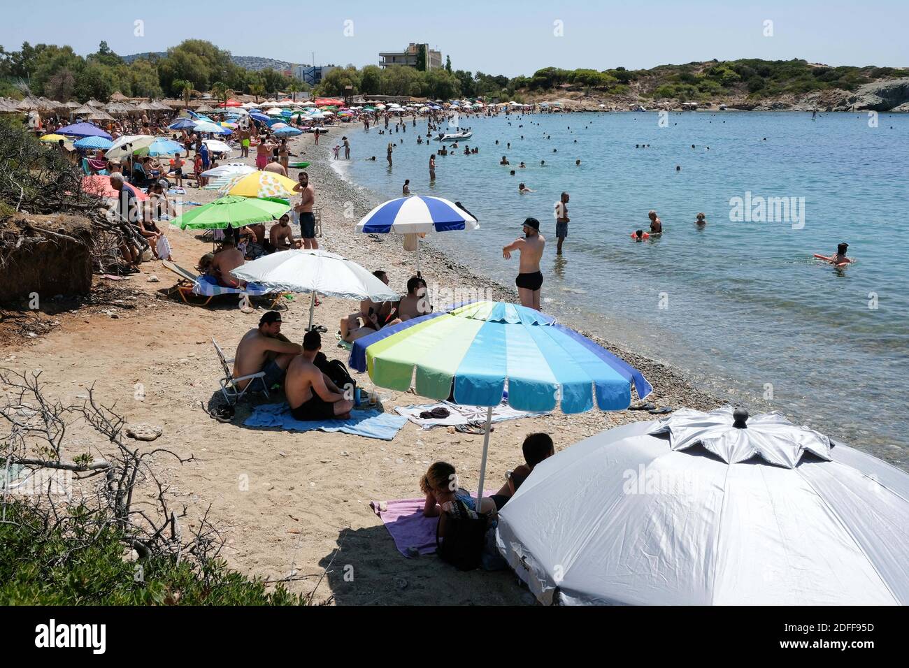 Crowd bathing at the beach as the coronavirus crisis is still going on ...