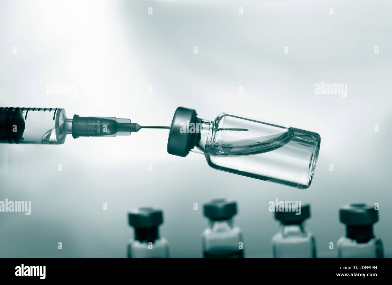 Medical concept Vaccination vaccine vial dose flu shot drug needle ...