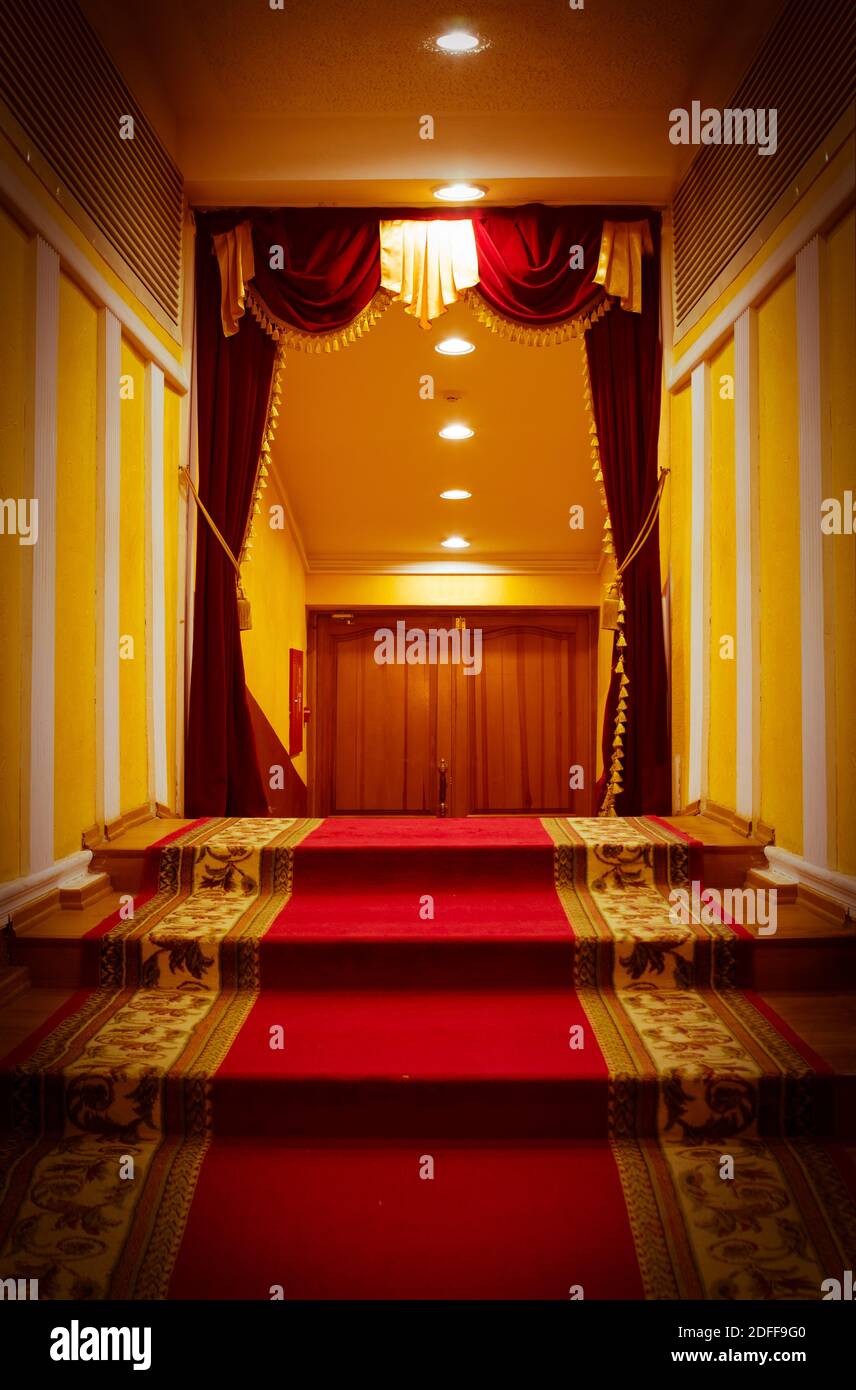 Wooden doors and red velvet curtain Stock Photo - Alamy