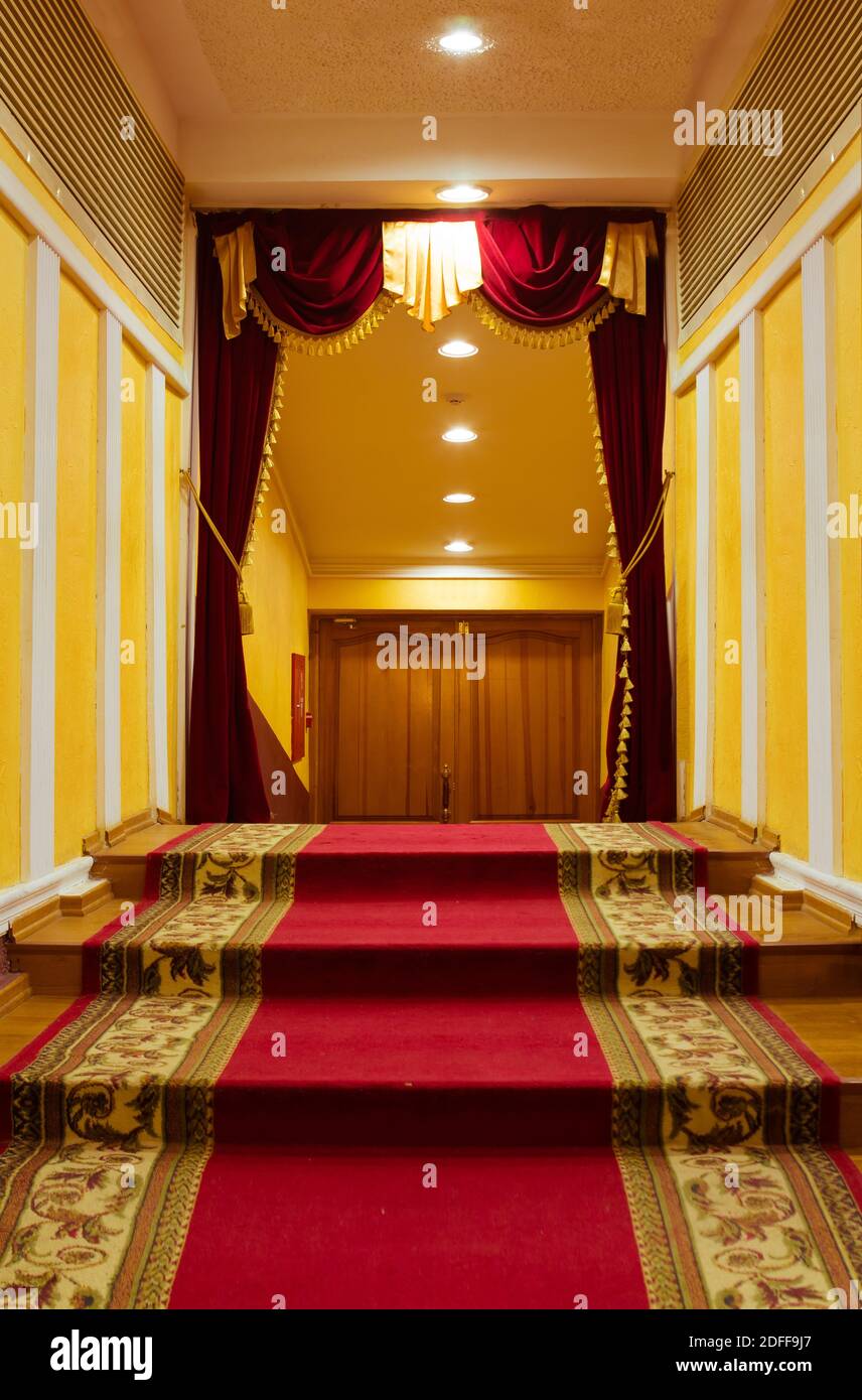 Wooden doors and red velvet curtain Stock Photo - Alamy