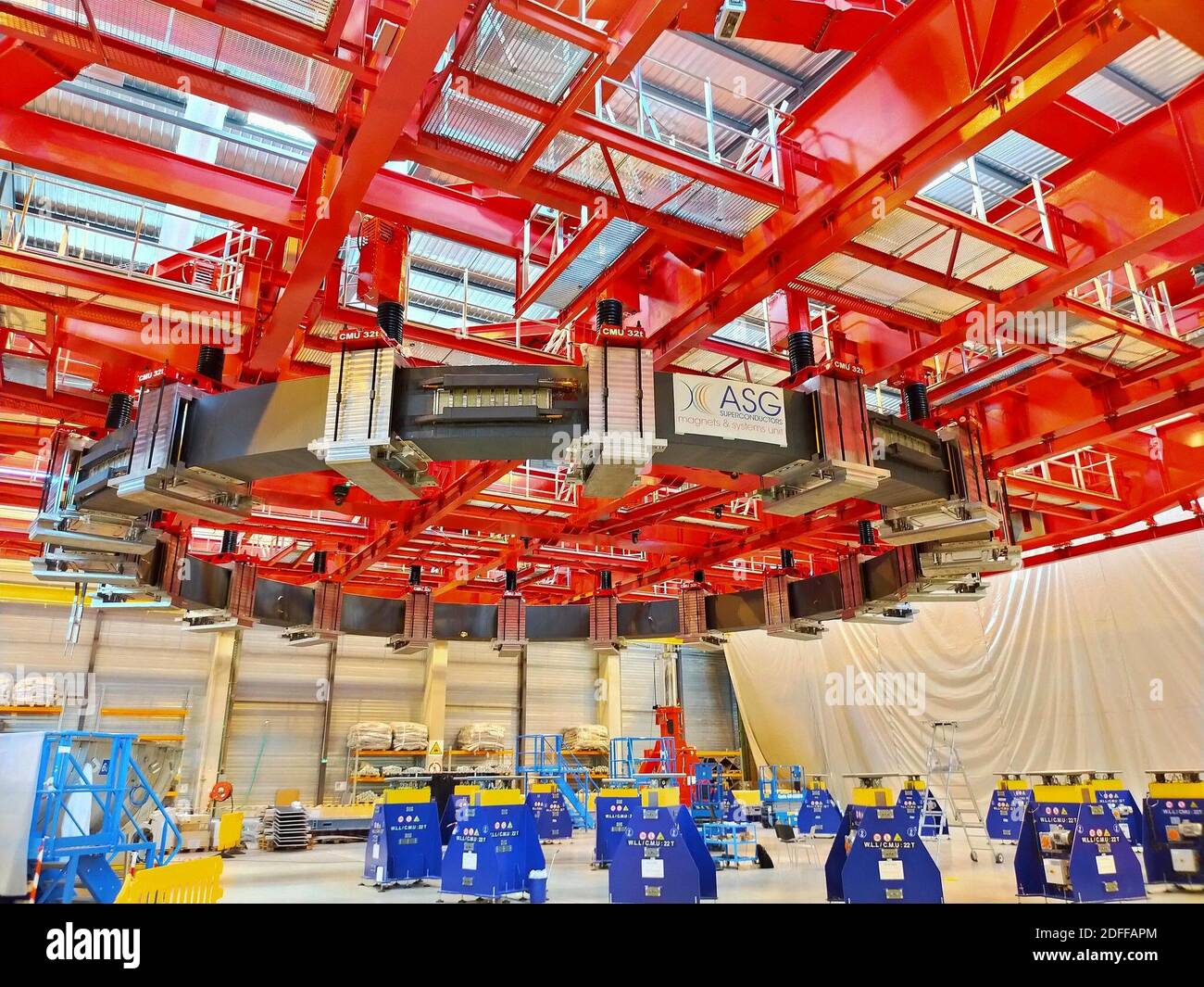Handout photo. The fifth poloidal field coil (PF5) is now fully ...