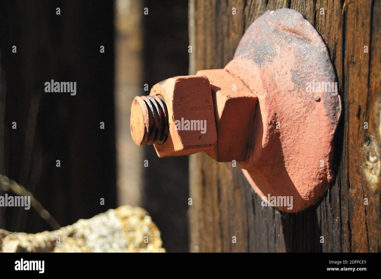 A bolt and nuts that are part of an old wooden bridge Stock Photo - Alamy