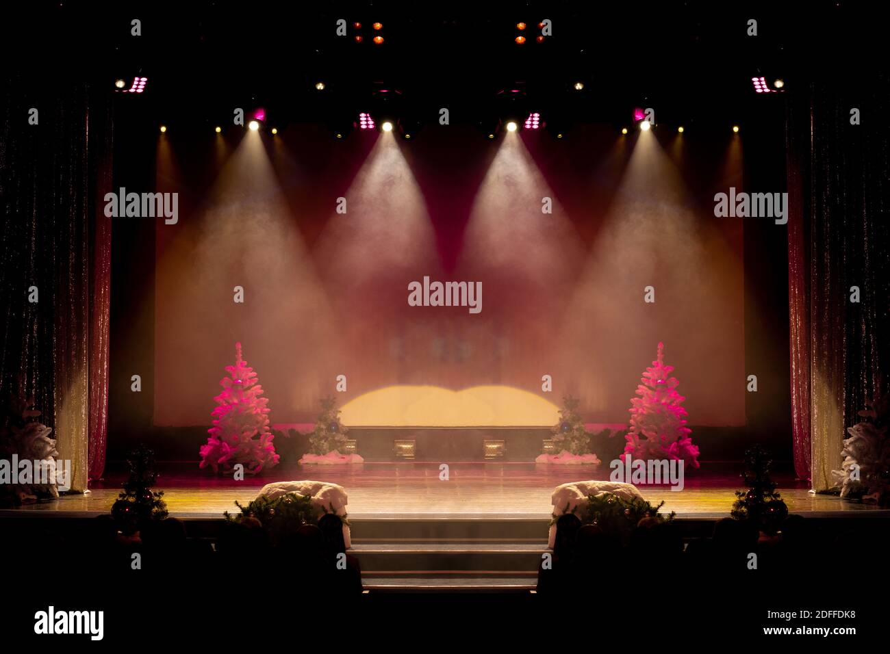 scene, stage light with colored spotlights and smoke, christmas tree ...