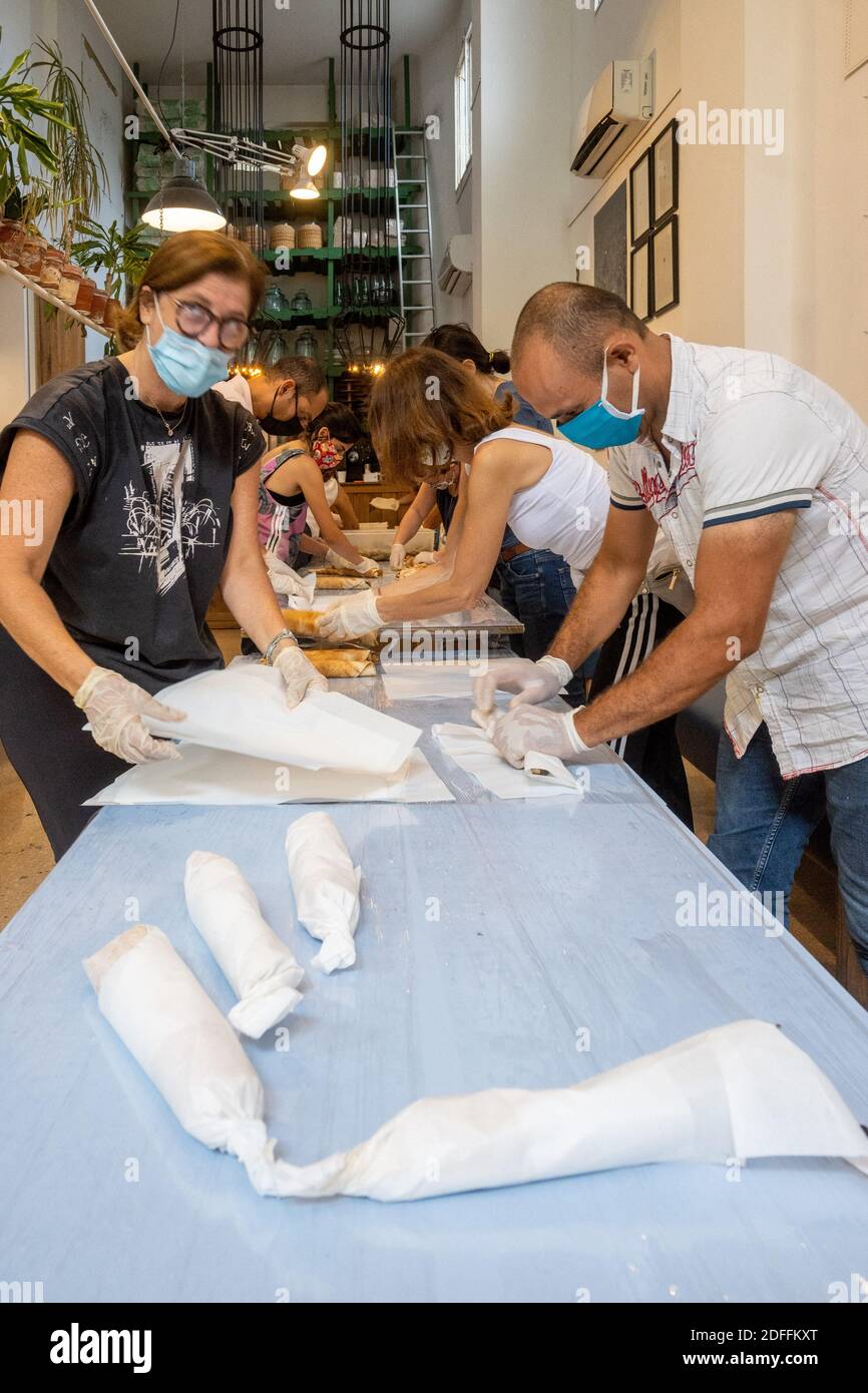 Lebanese cuisine advocate Kamal Mouzawak and his volunteers team at ...