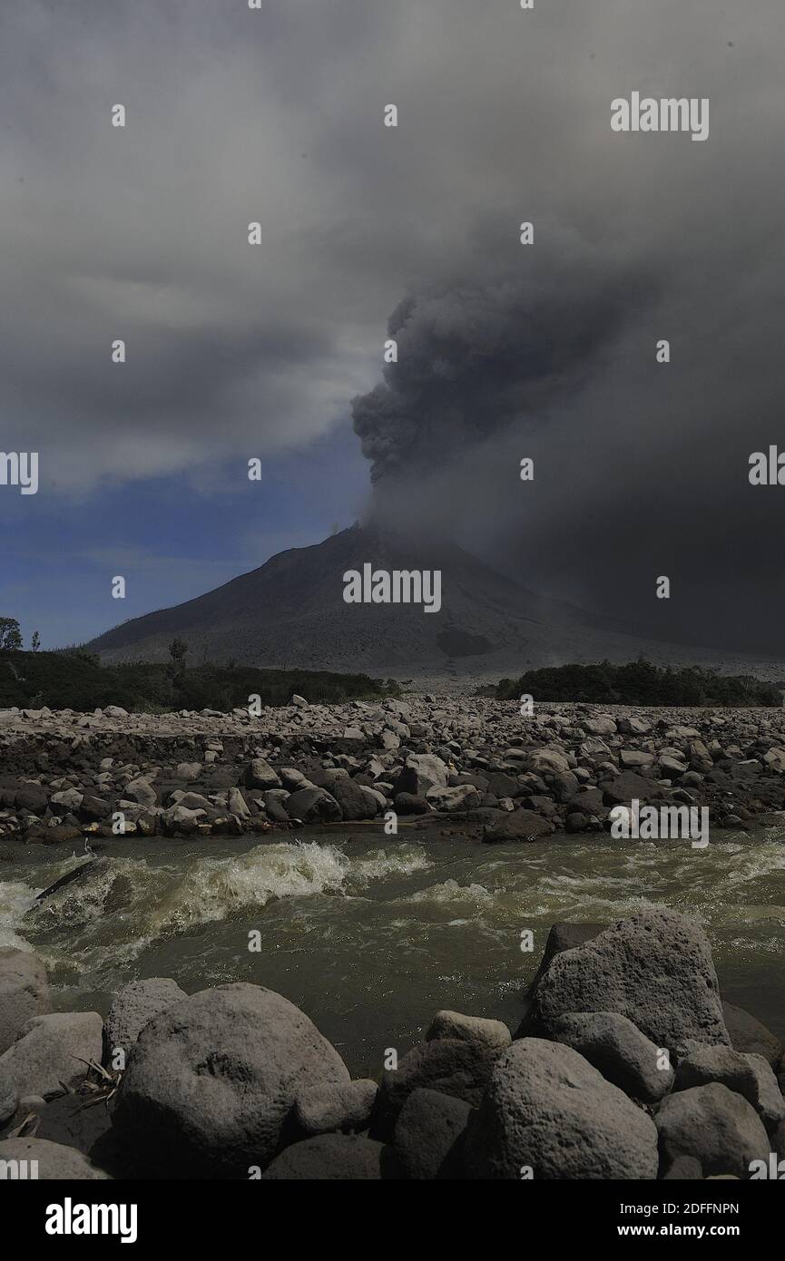 Sinabung volcano seen spews volcanic ash during eruption on August 18 ...