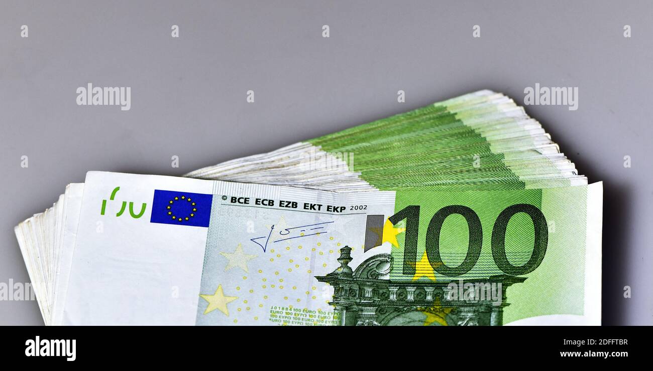 a pile of 10,000 euros in one hundred 100 euro banknotes isolated on ...