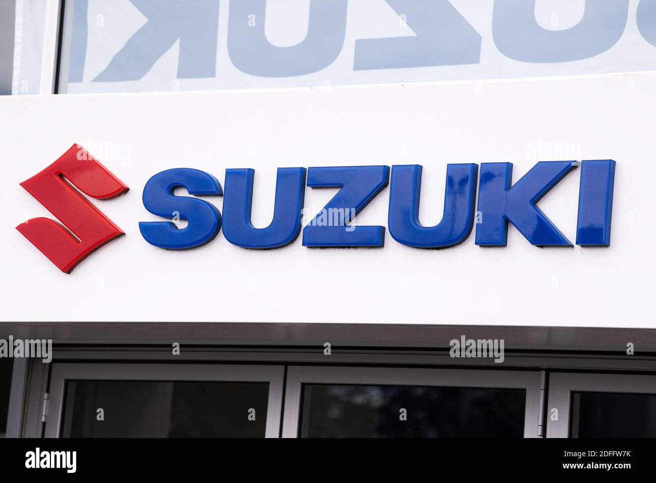 A shop sign of SUZUKI on August 24 2020 in Saint-Nazaire France. Photo ...