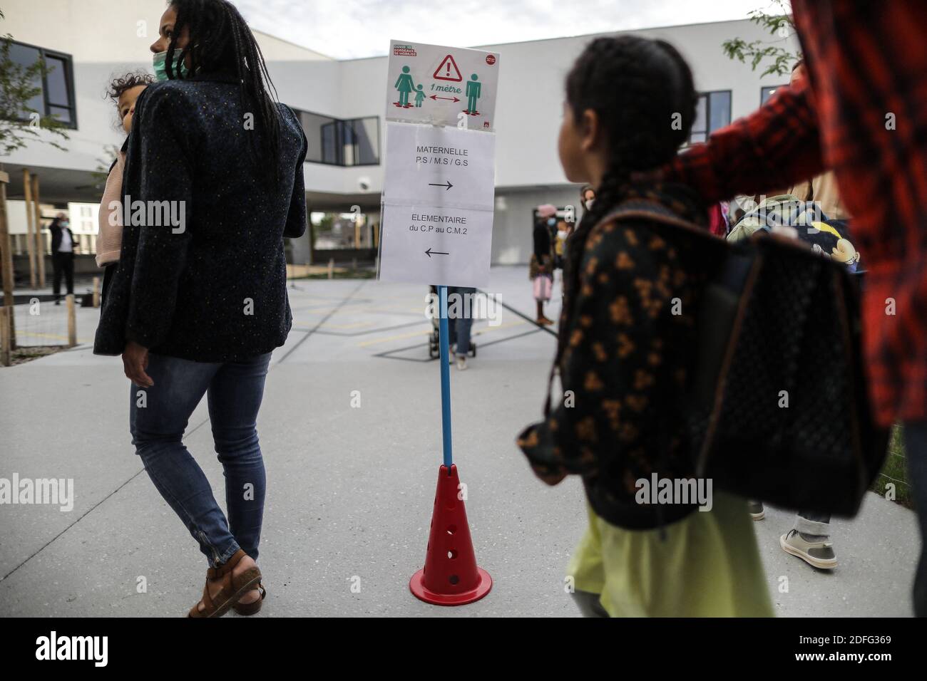 Pupils arrive for the first day of school for the 2020-2021 school year ...