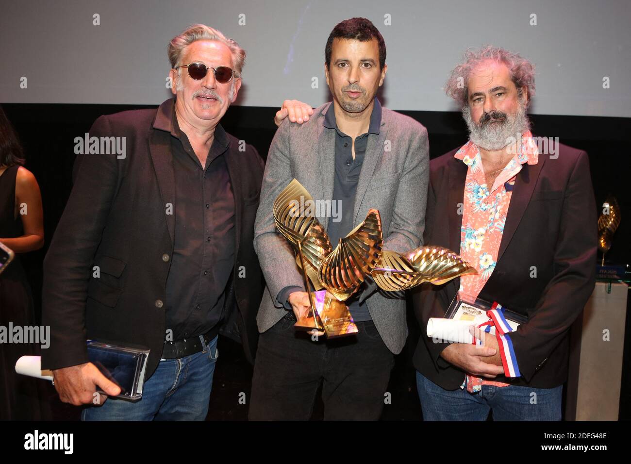 Benoit Delepine, Samir Guesmi and Gustave Kervern attending the closing ...