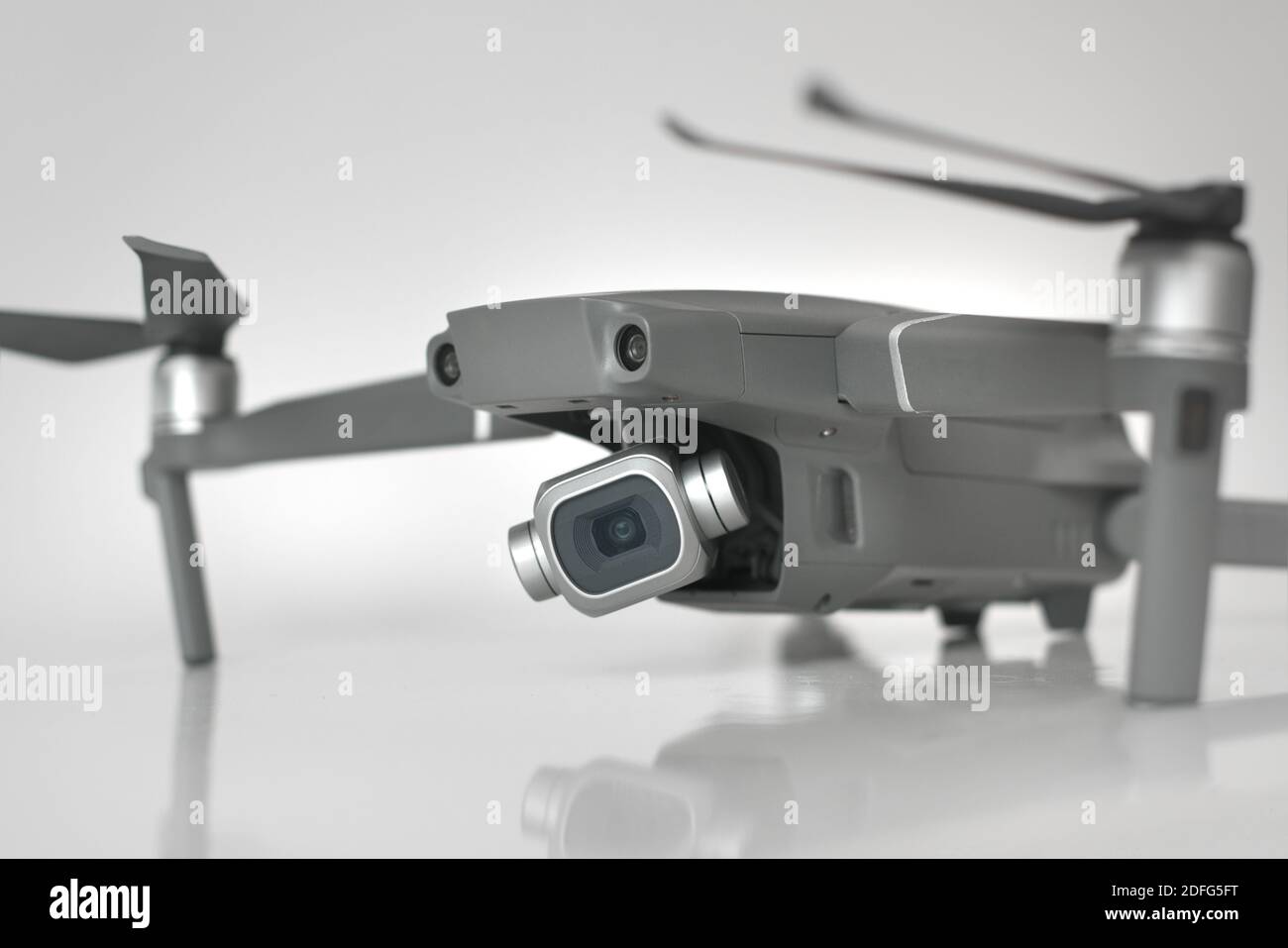 Close up of new dark grey drone isolated on gray background Stock Photo ...