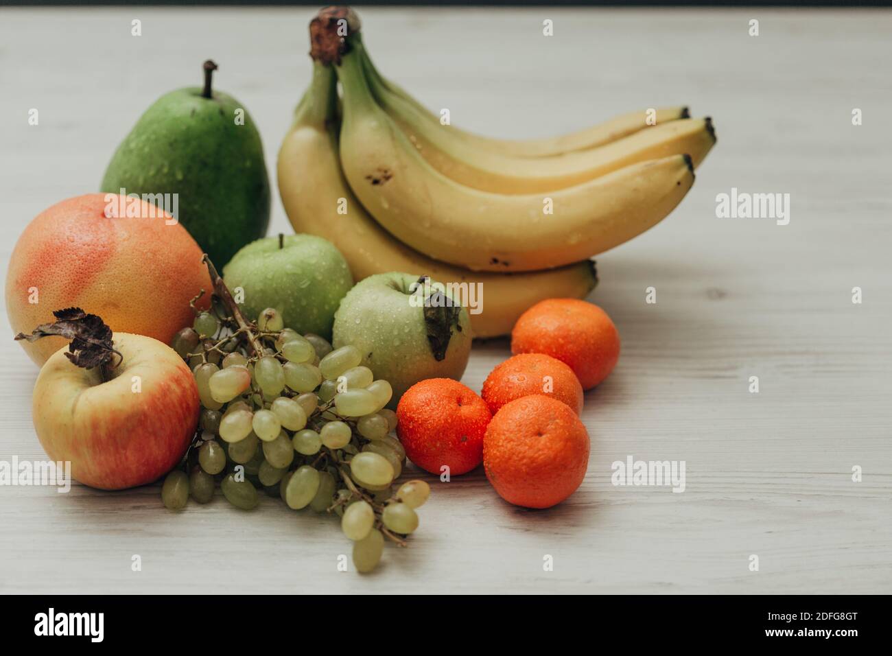 Composition with Summer Colorful Fruits on Wooden White Background ...