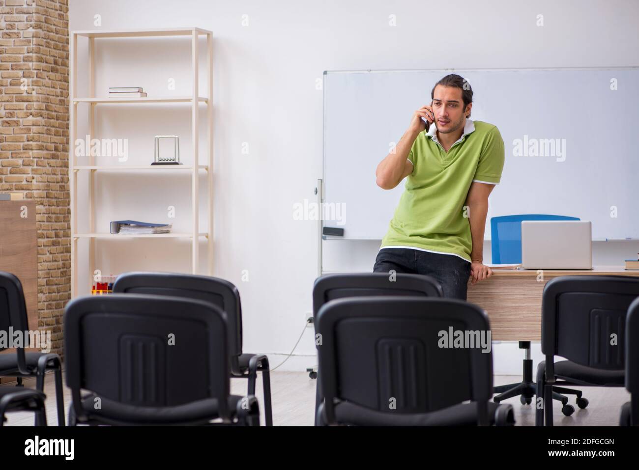 Young student in business presentation concept Stock Photo - Alamy