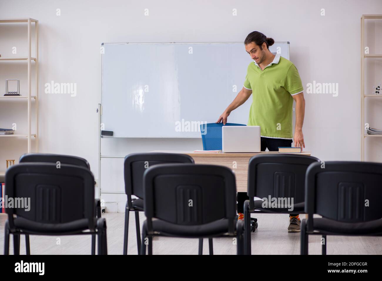 Young student in business presentation concept Stock Photo - Alamy