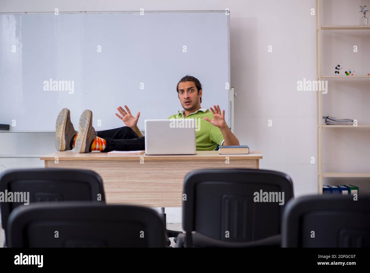 Young student in business presentation concept Stock Photo - Alamy