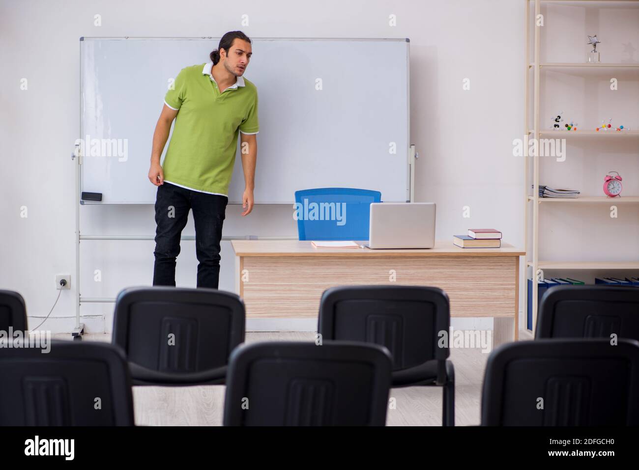 Young student in business presentation concept Stock Photo - Alamy