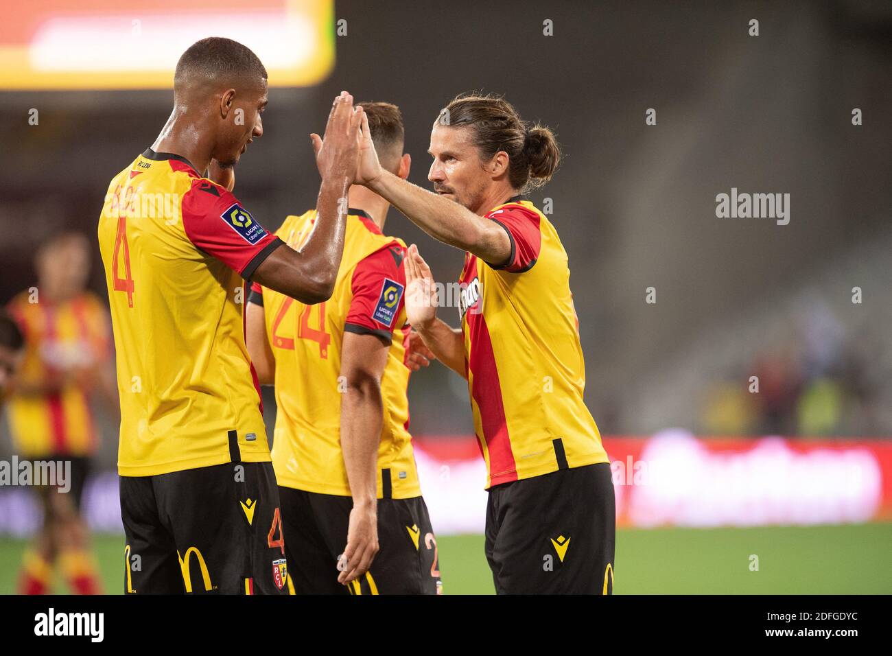 Lens team players celebrate their victory after winning during the ...