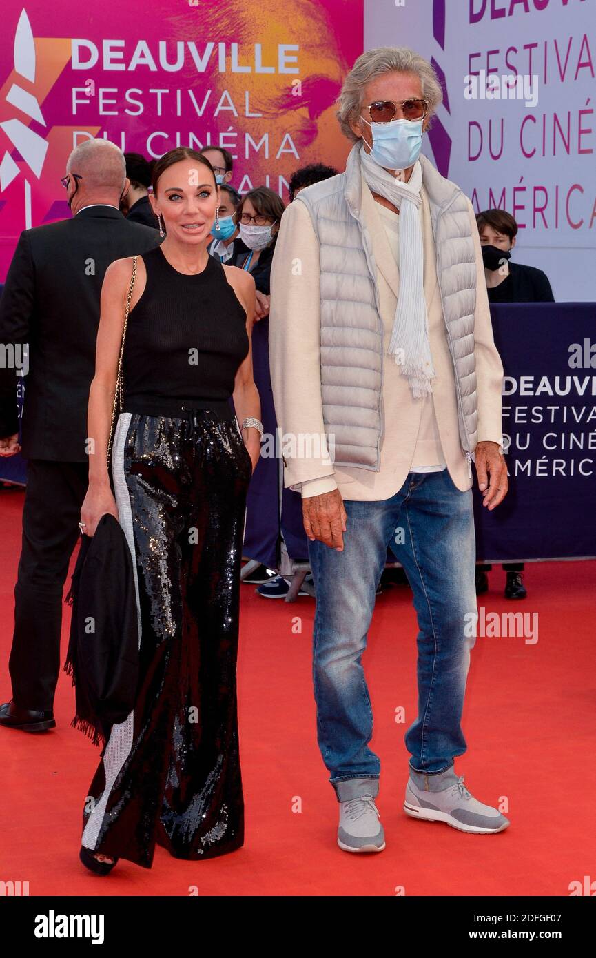 Dominique Desseigne and wife attending the screening of the movie ADN ...