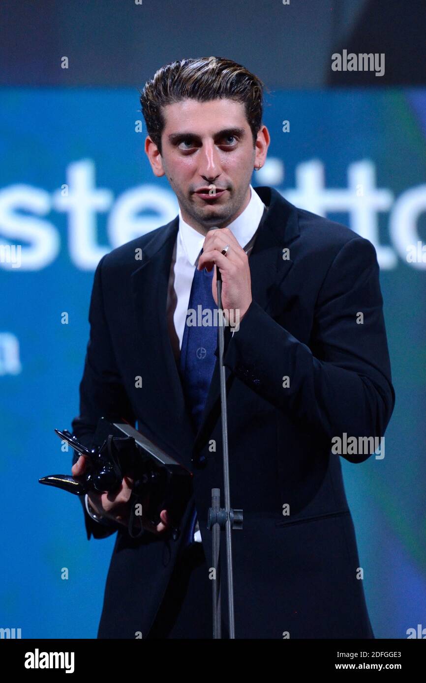 Director Pietro Castellitto poses with the Orizzonti Award for Best ...