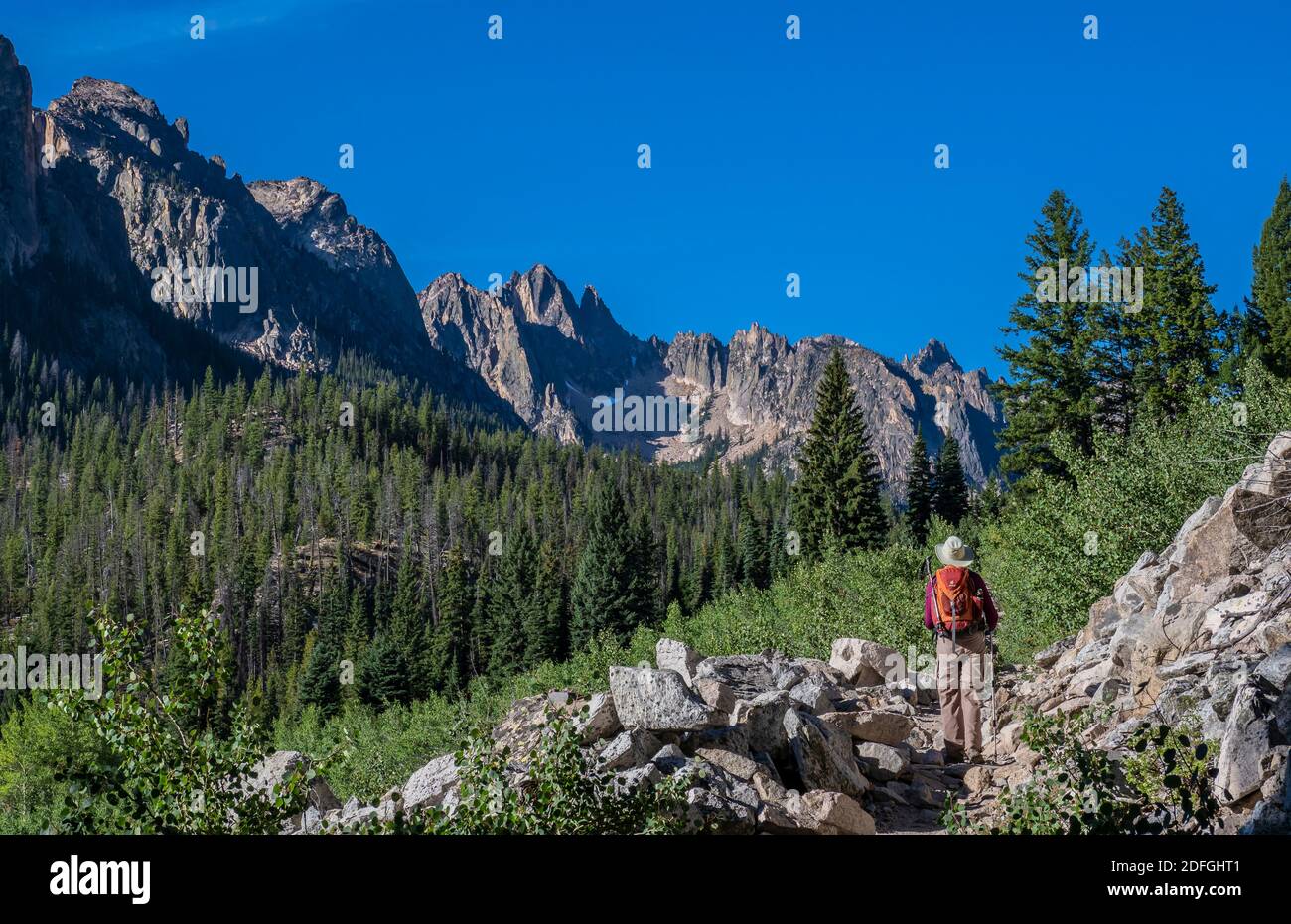 Woman hikes the Redfish Lake Creek Trail, Sawtooth National Recreation ...