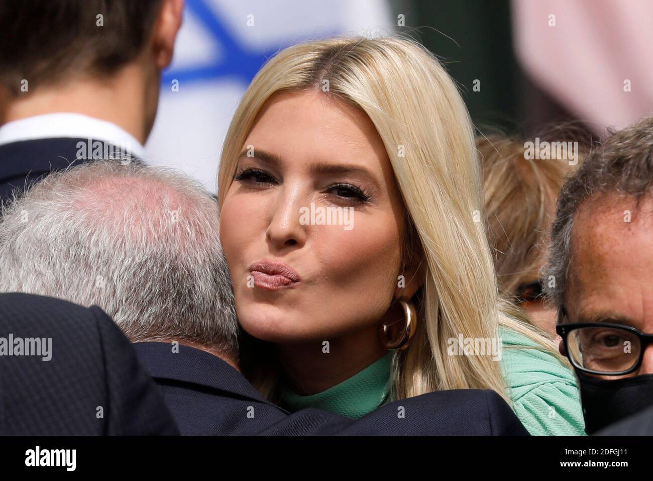 Ivanka Trump kisses a guest as she arrives at an Abraham Accords ...