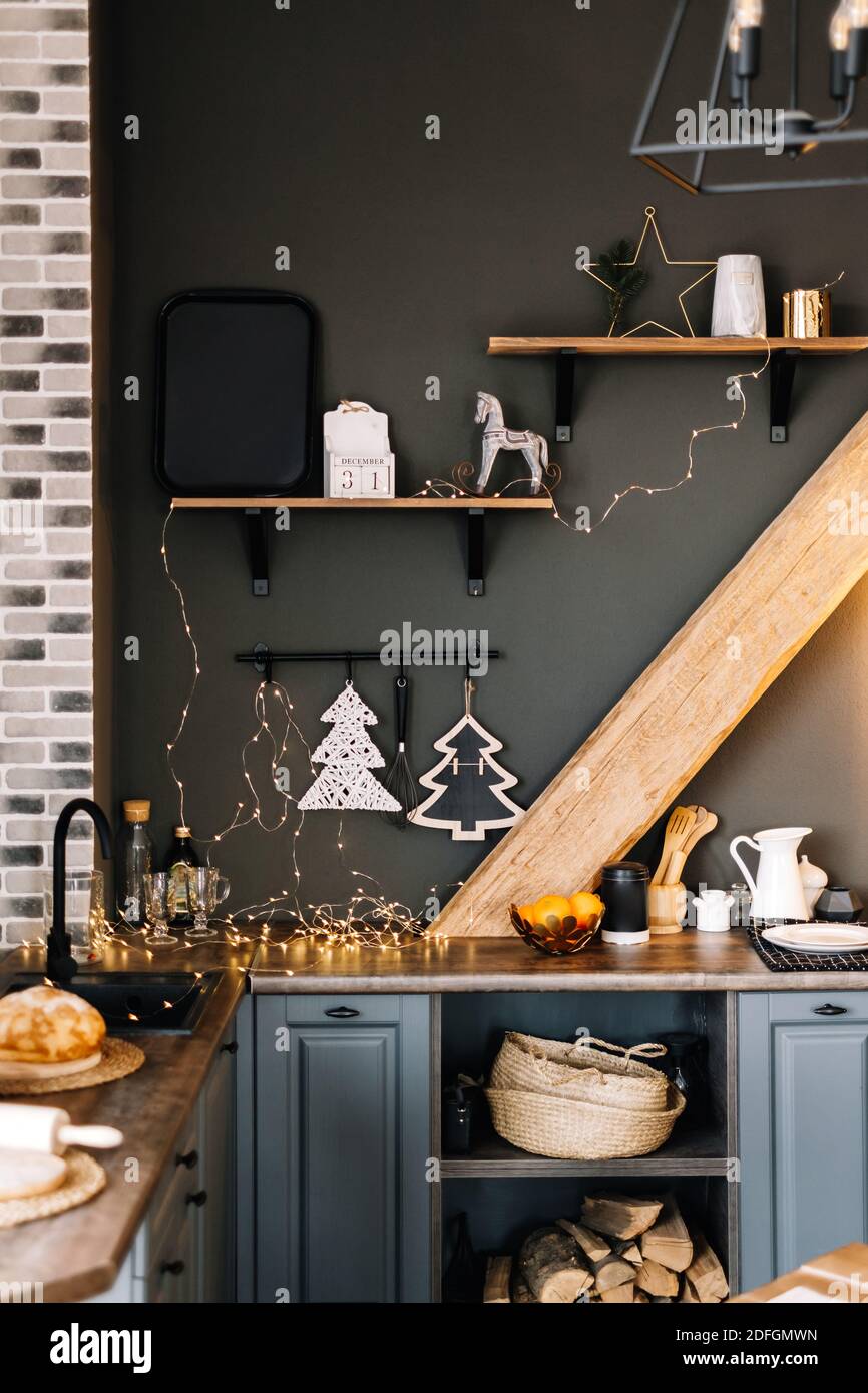Modern kitchen interior with Christmas decorations. High quality photo ...