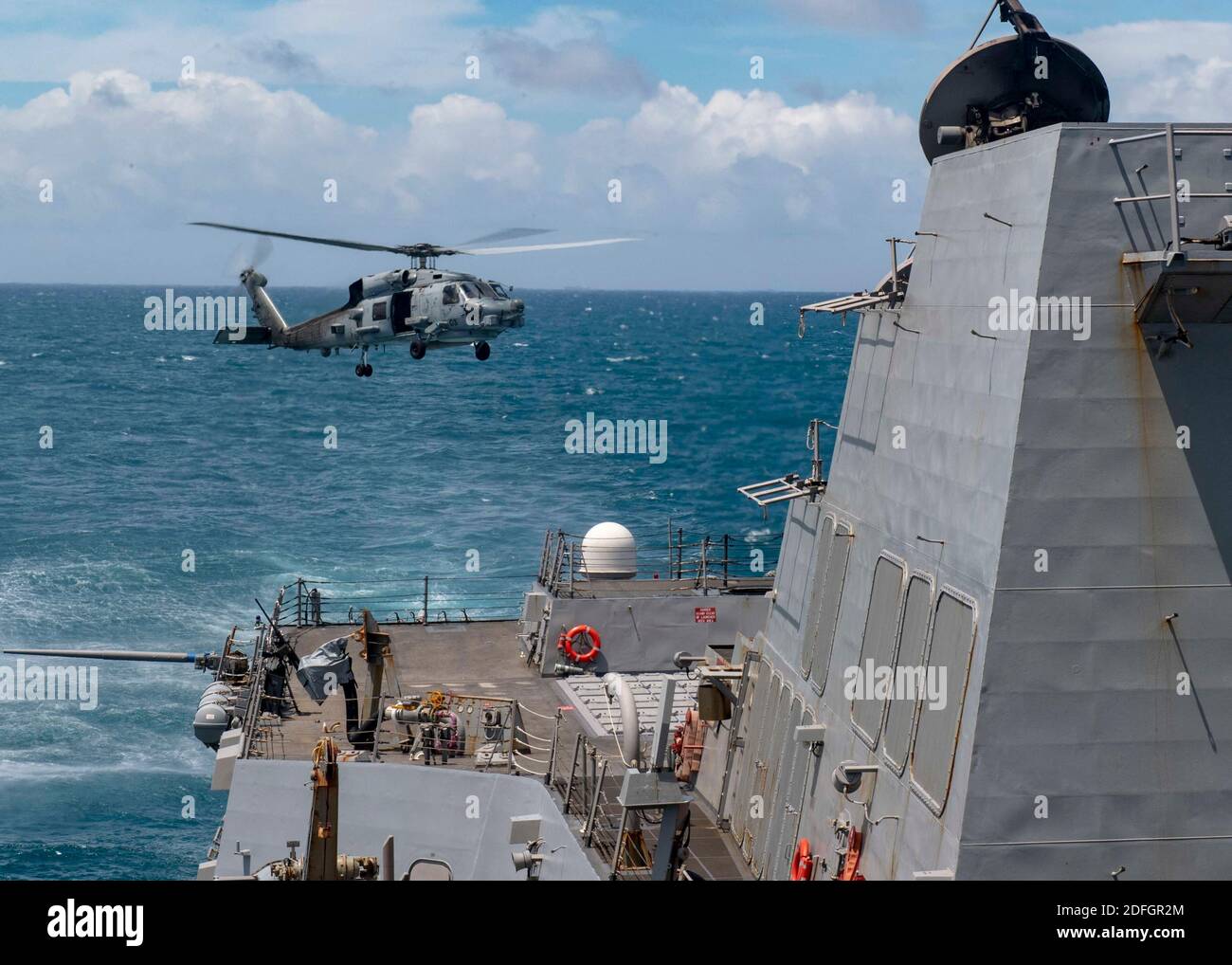 Hand out file photo dated August18, 2020 of an MH-60R helicopter ...