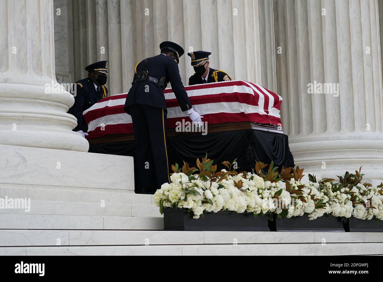 The flag-draped casket of Justice Ruth Bader Ginsburg lies in repose at ...